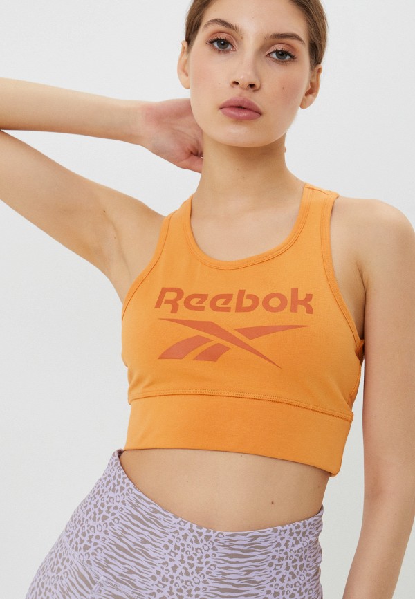 Топ спортивный Reebok RI BL COTTON BRALETTE, цвет: оранжевый ...