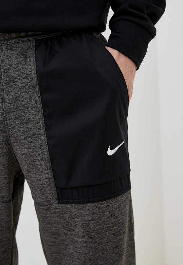 Брюки спортивные Nike M Nk Tf Pant Taper Novelty цвет серый
