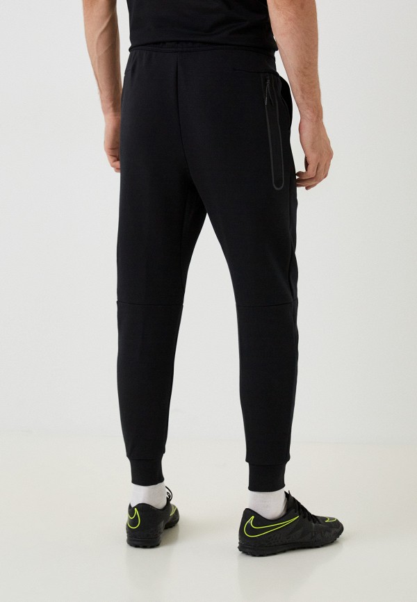 Брюки спортивные Nike Lfc M Nsw Tch Flc Jggr Aw цвет черный