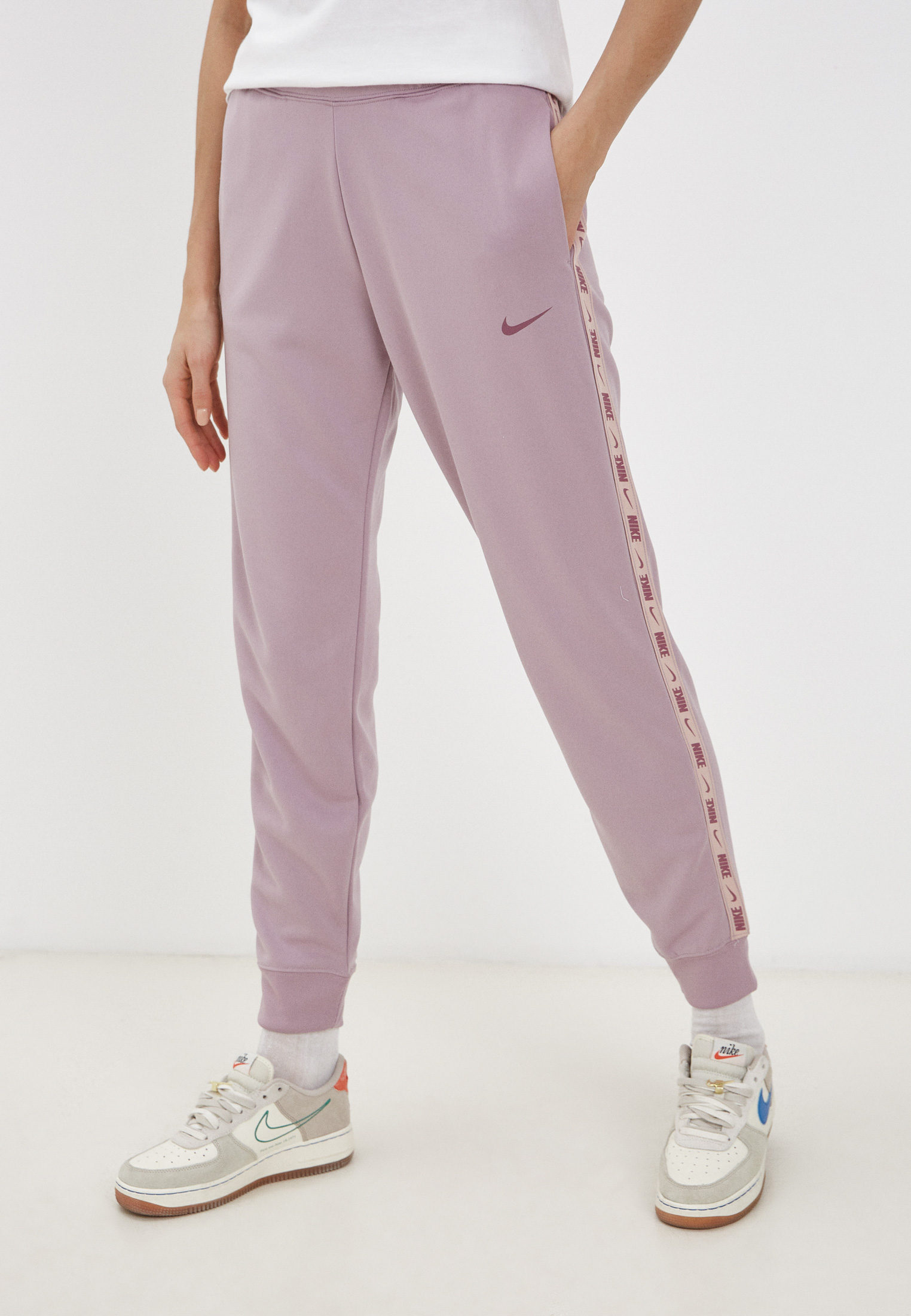 Брюки спортивные Nike W Nsw Pk Tape Reg Pant цвет фиолетовый